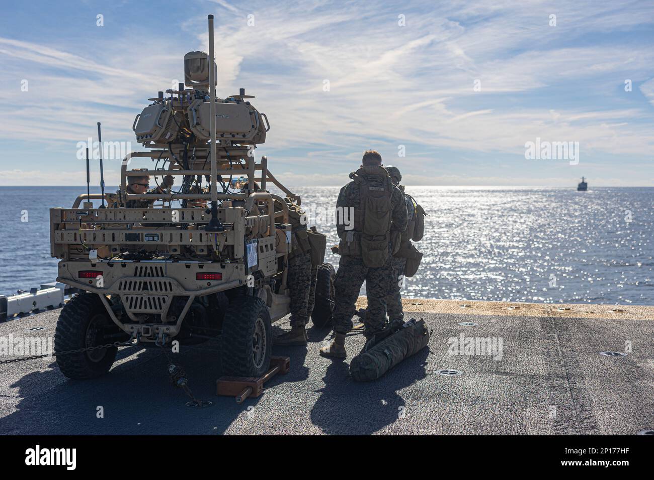 U.S. Marines with the 26th Marine Expeditionary Unit (MEU), track a ...