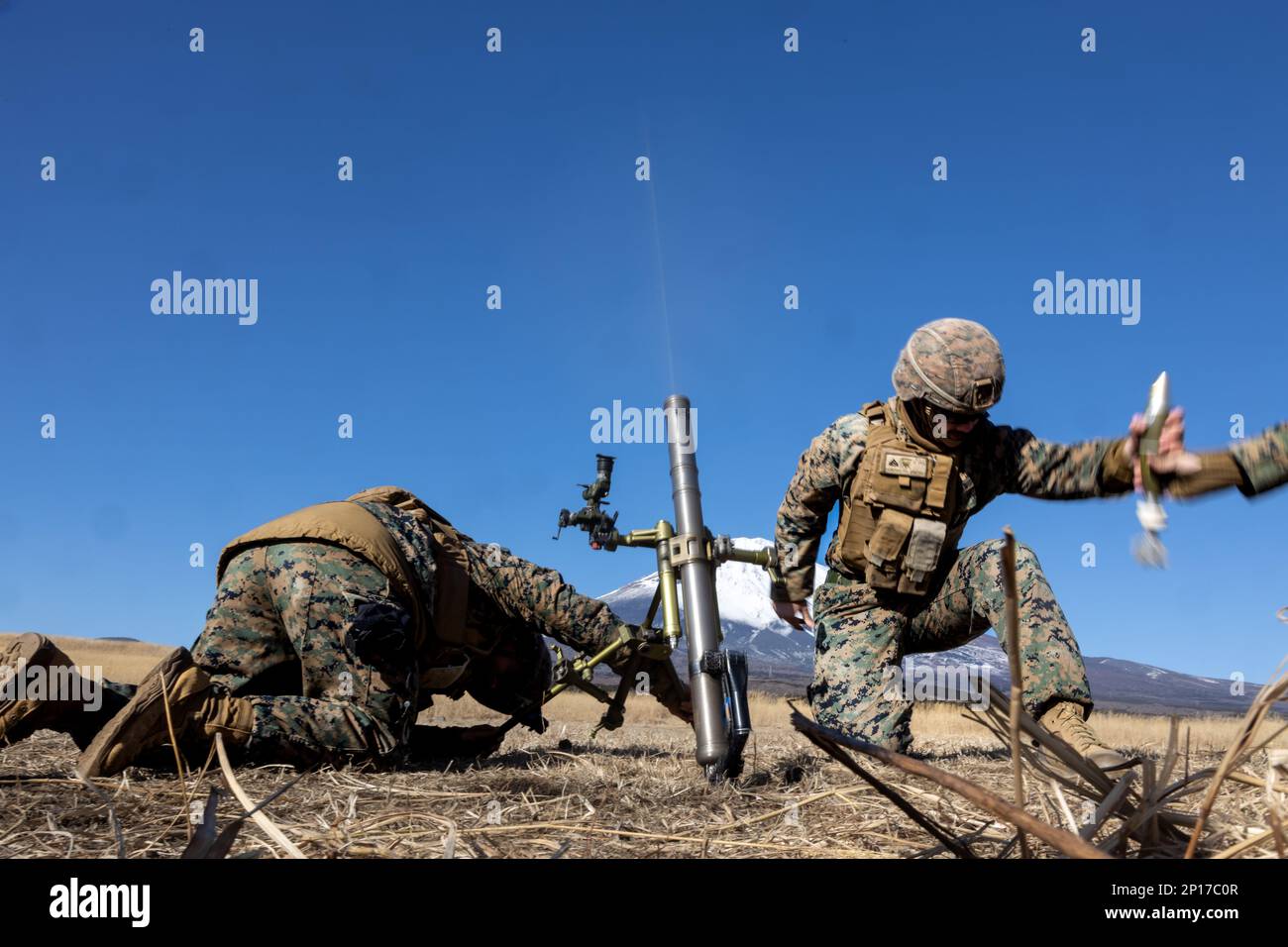 U.S. Marines with 3d Battalion, 4th Marines fire an M224 60 mm mortar ...