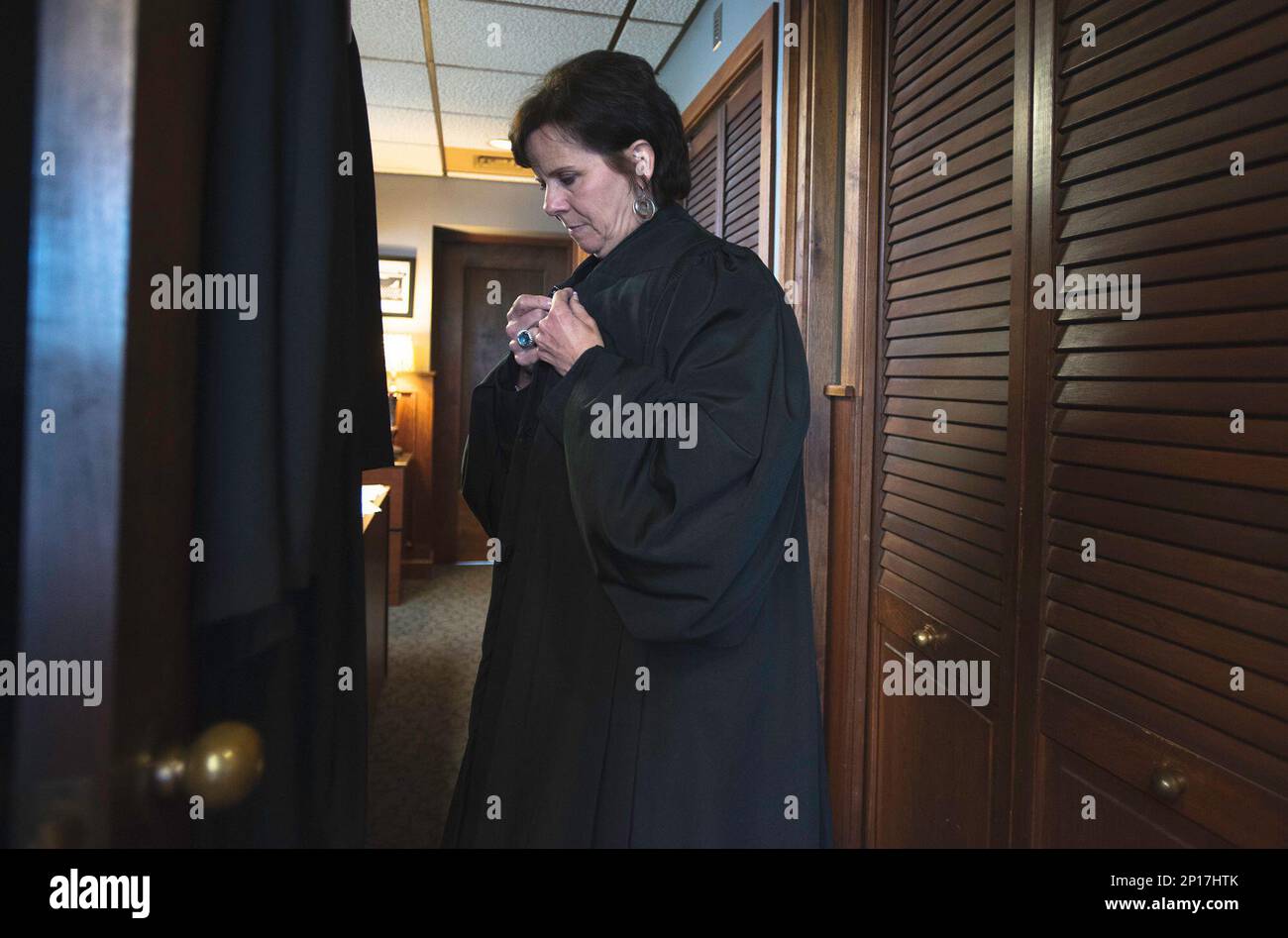 Judge Linda Cordaro dresses in her robe inside her chambers at the ...