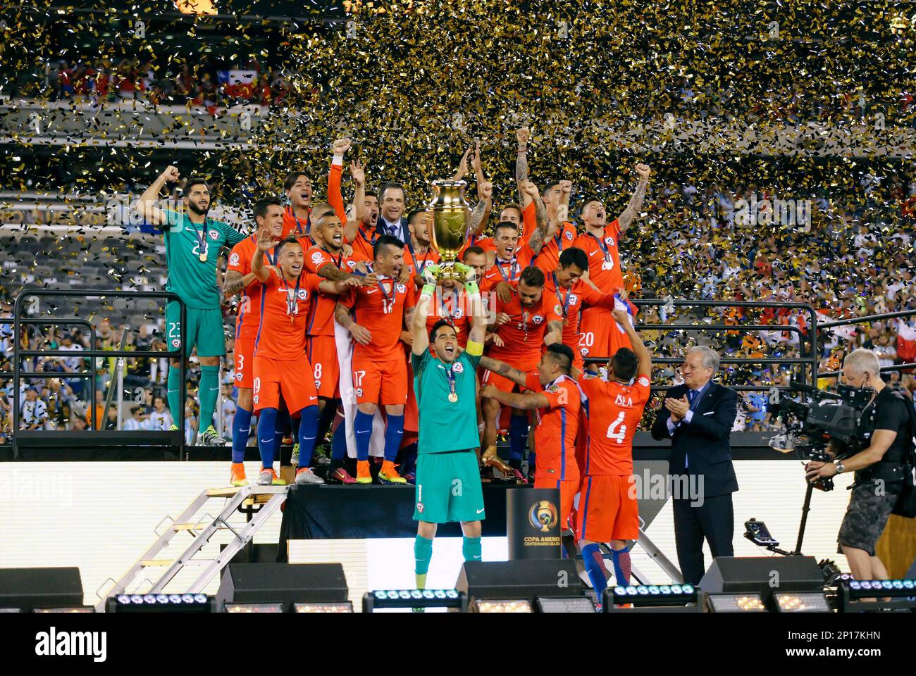 26 June 2016: Chile goalkeeper Claudio Bravo (1) hoists the trophy as ...