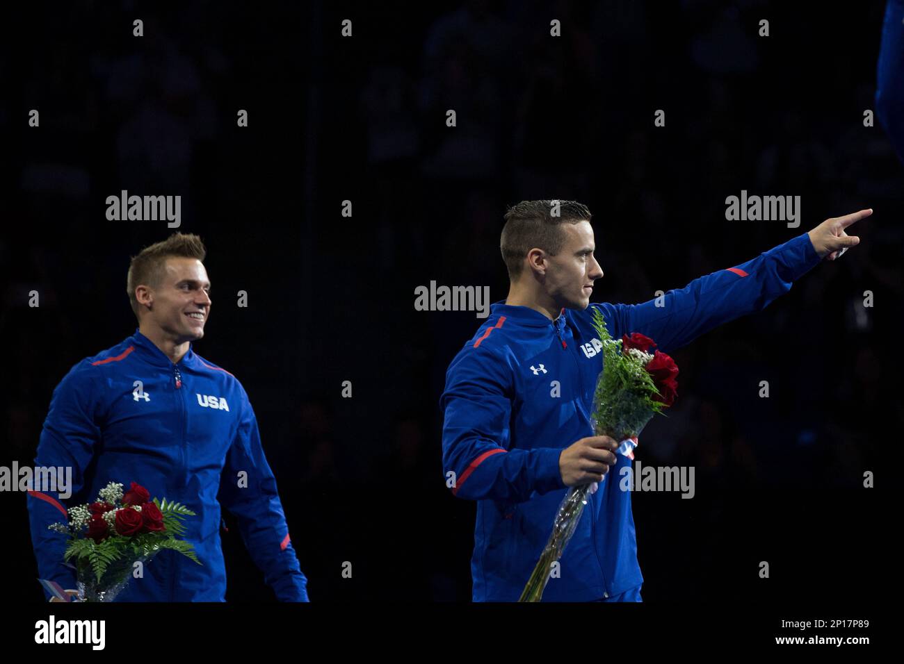 June 25, 2016: Jacob Dalton (right) and Sam Mikulak react as the Rio ...