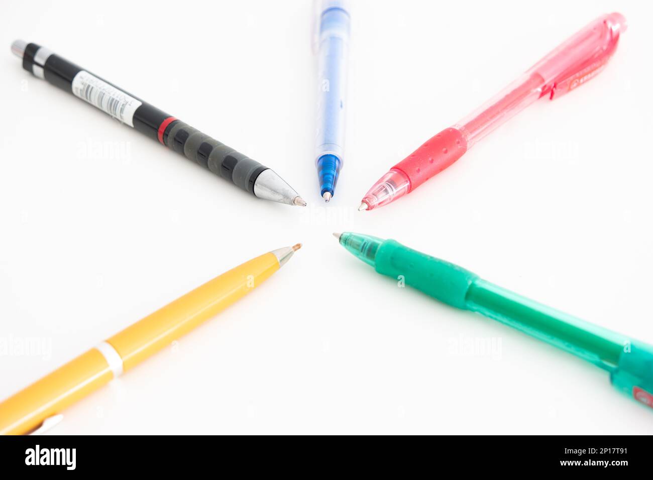 Variety of colorful ball pens top view studio shot isolated on white ...