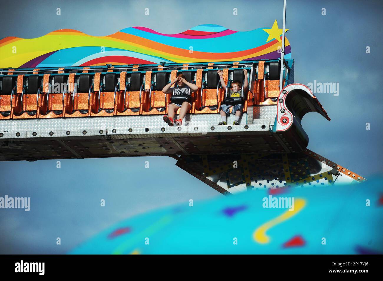 Two kids ride the Magic Carpet during Michigan Center Lions Club's 59th ...