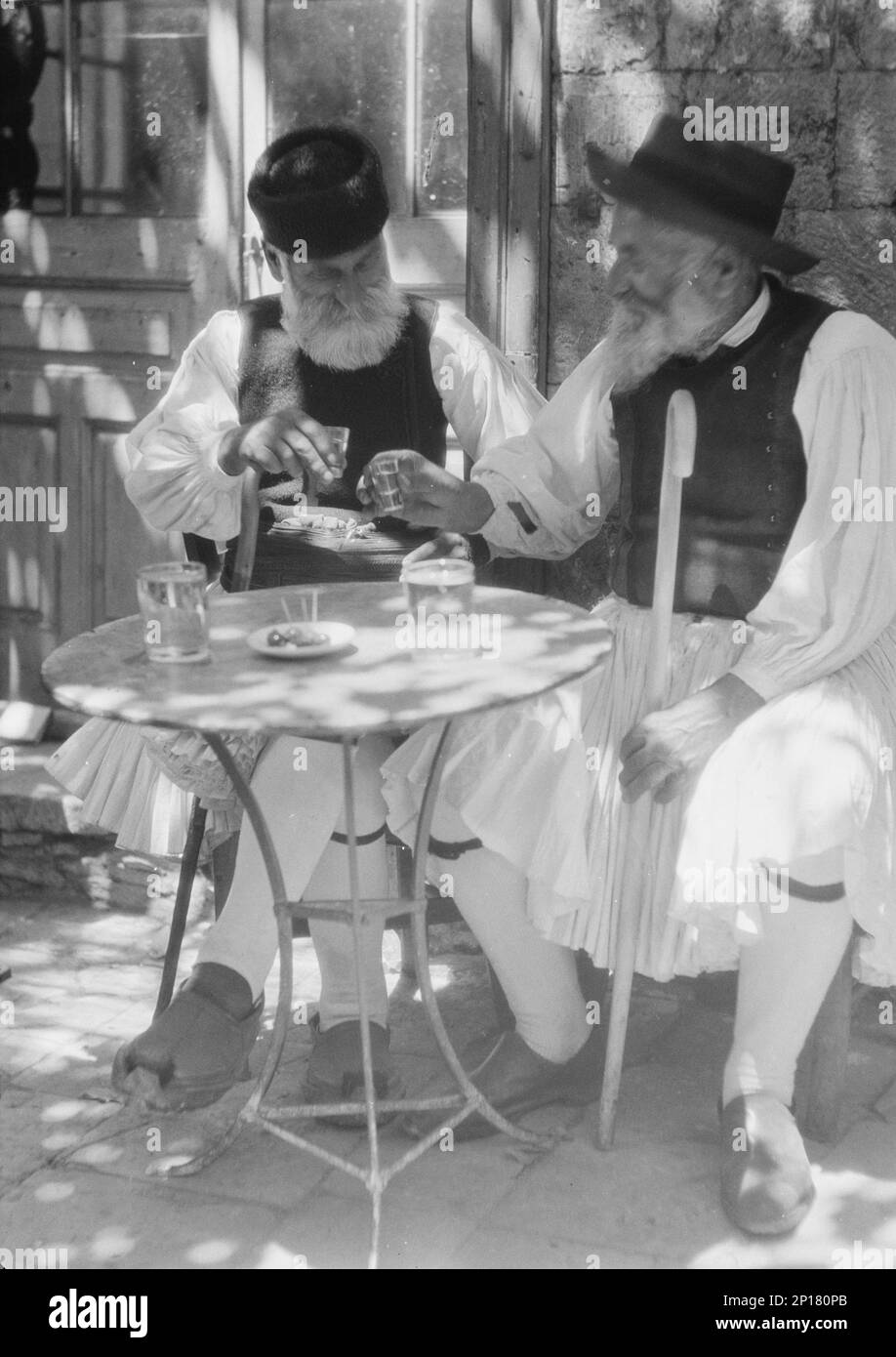 Travel views of Europe, between 1904 and 1938. Men in traditional Greek ...