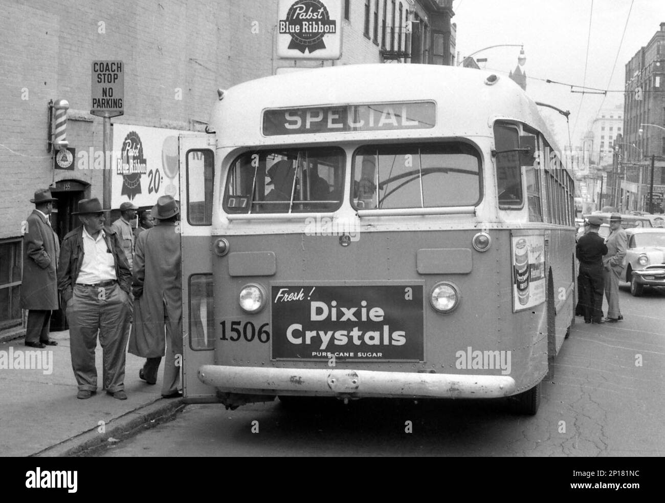 African American men preparing to board a segregated bus in an act of ...