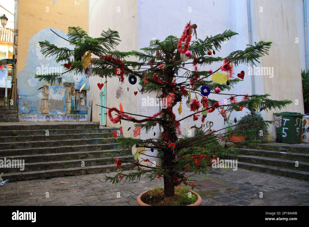 Pieces of ancient poems painted on the walls of the historic center of ...