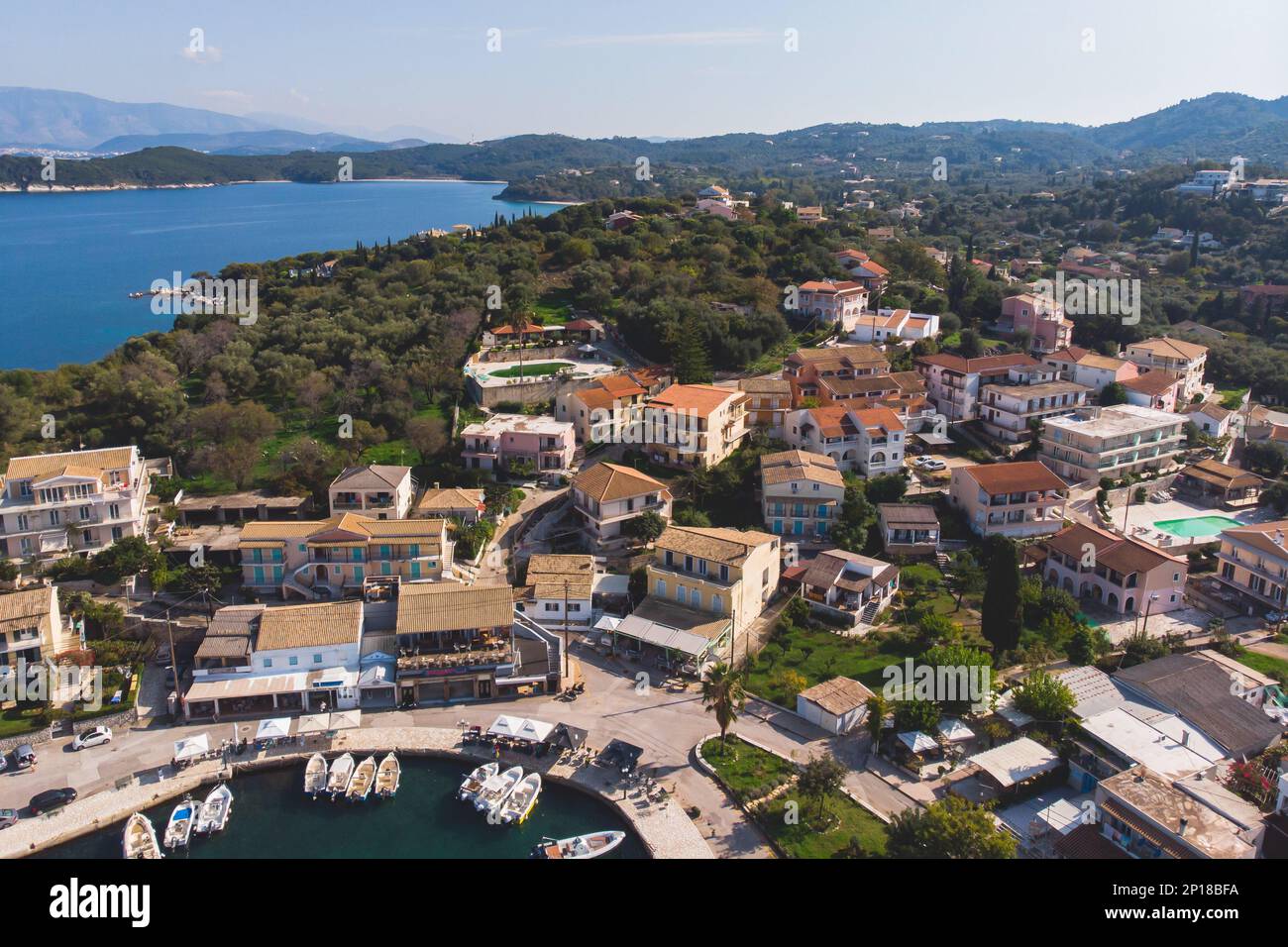 Aerial drone view of Kassiopi, village in northeast coast of Corfu ...