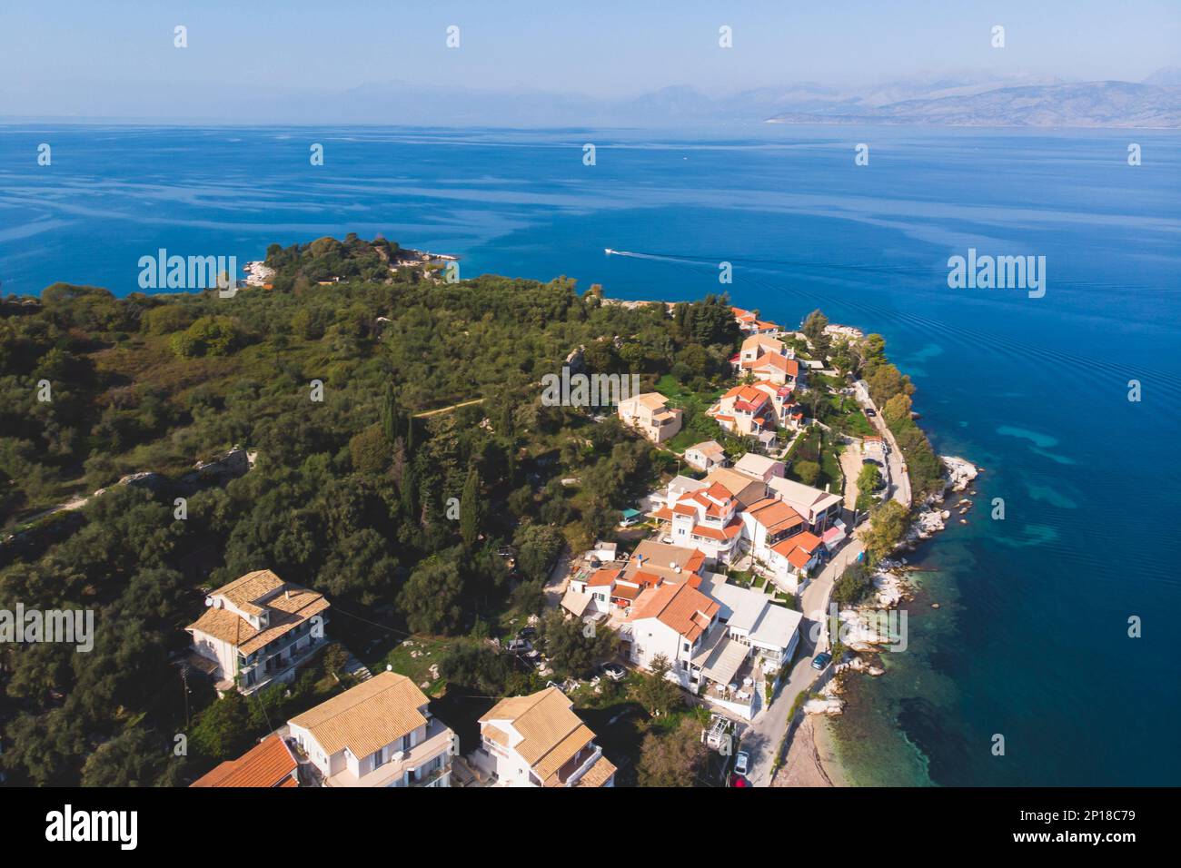 Aerial drone view of Kassiopi, village in northeast coast of Corfu ...