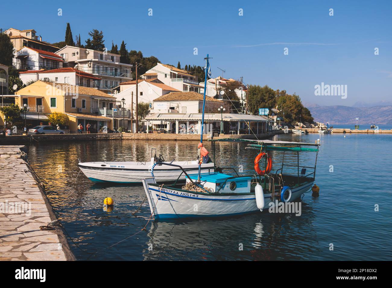 Aerial view of Kassiopi, village in northeast coast of Corfu island ...