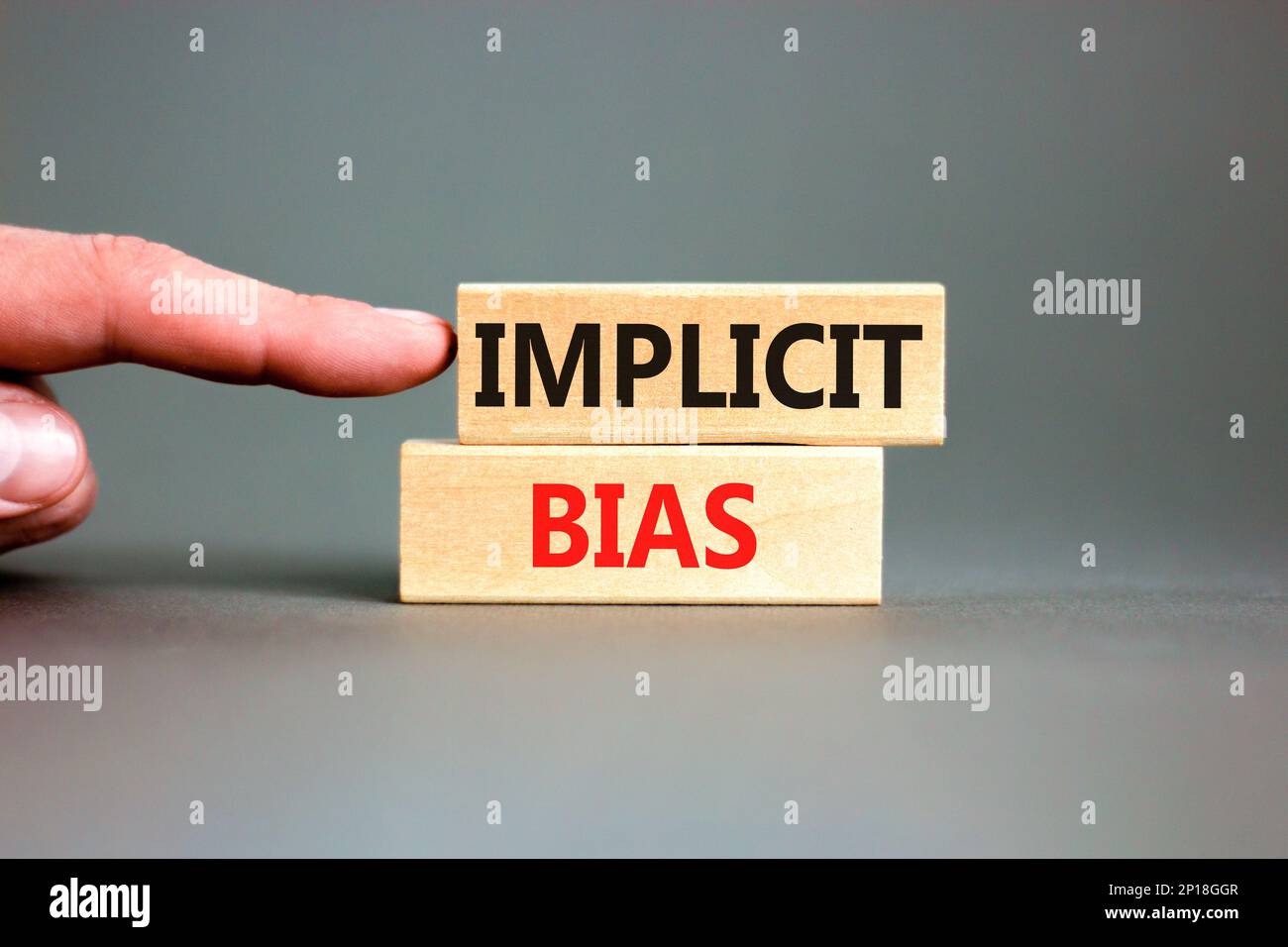 Implicit bias symbol. Concept words Implicit bias on wooden block ...
