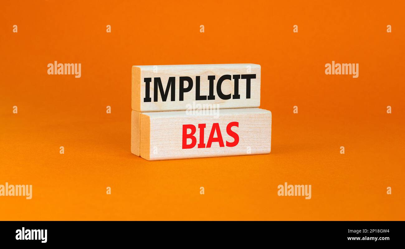 Implicit bias symbol. Concept words Implicit bias on wooden block ...