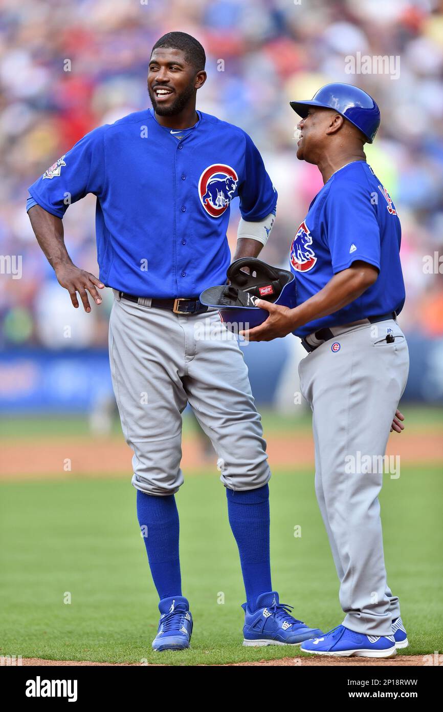 Chicago Cubs center Fowler Dexter Fowler (24) talks with third base ...