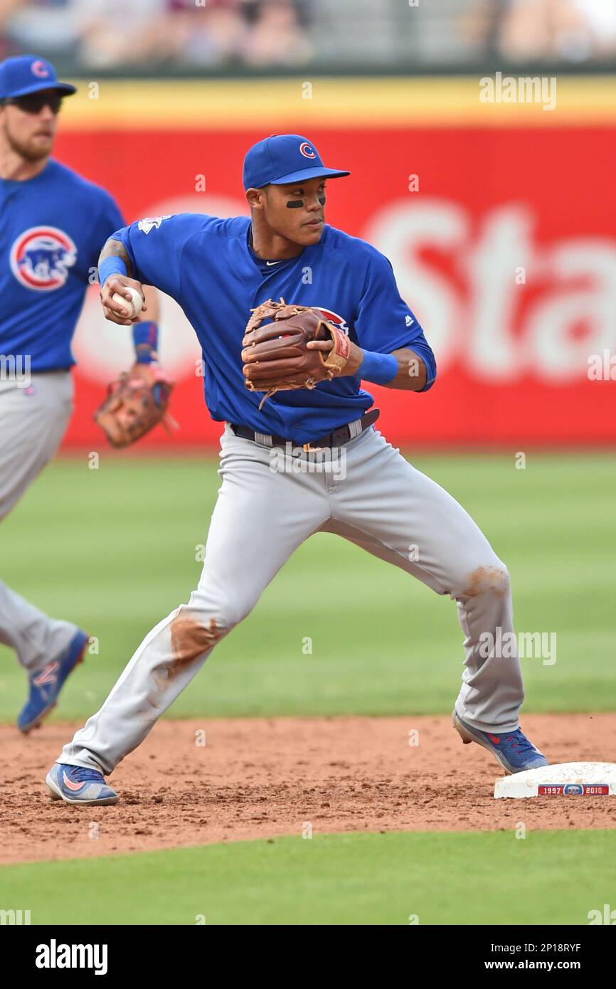 Chicago Cubs shortstop Addison Russell (27) makes the turn on a double ...