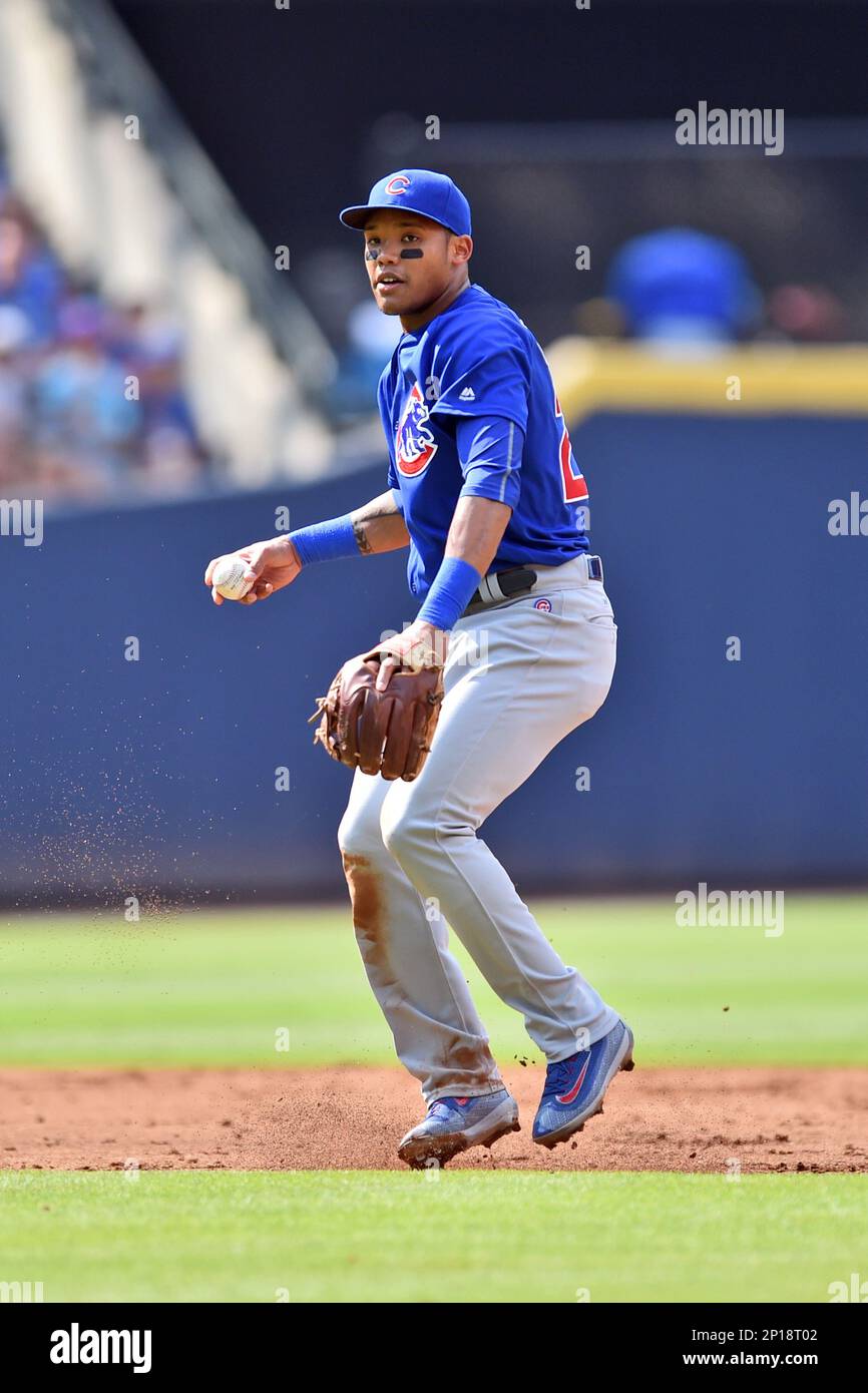 Chicago Cubs shortstop Addison Russell (27) fields the ball and throws ...