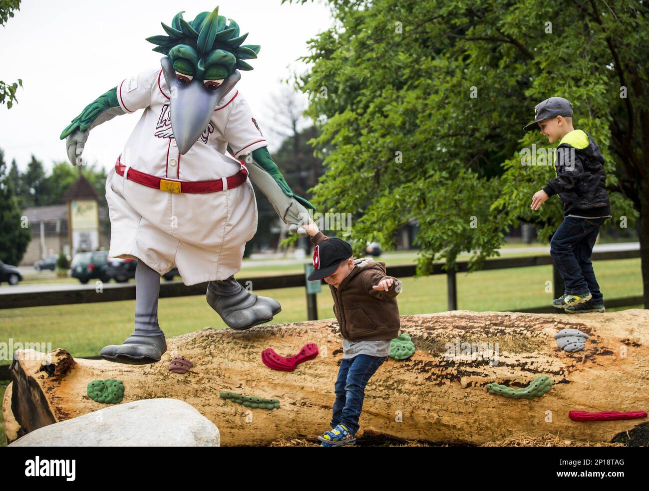 In this June 16, 2016 photo, kids play with Great Lakes Loons mascot ...