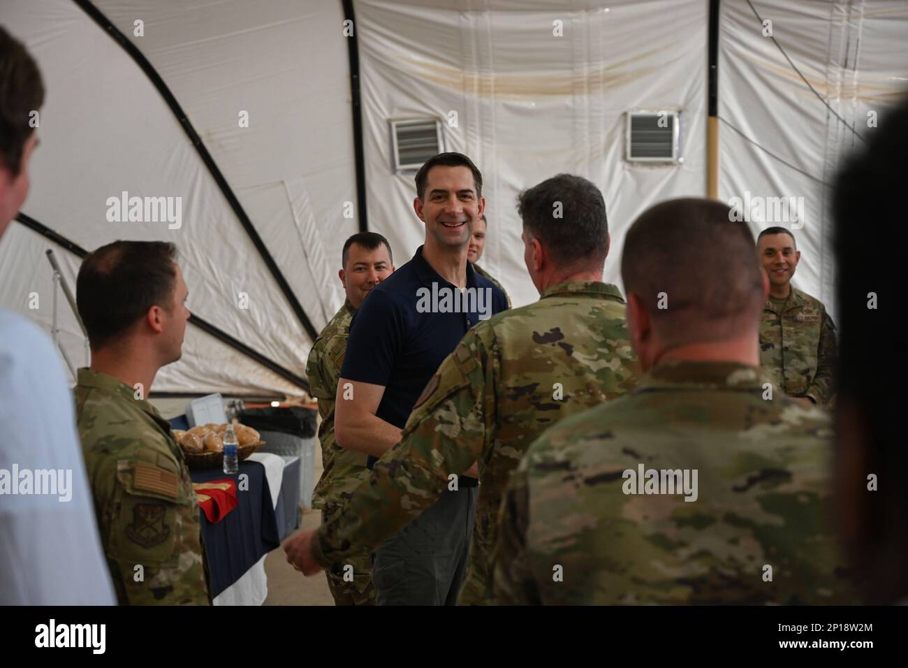 U.S. Sen. Tom Cotton of Arkansas speaks with U.S. service members ...