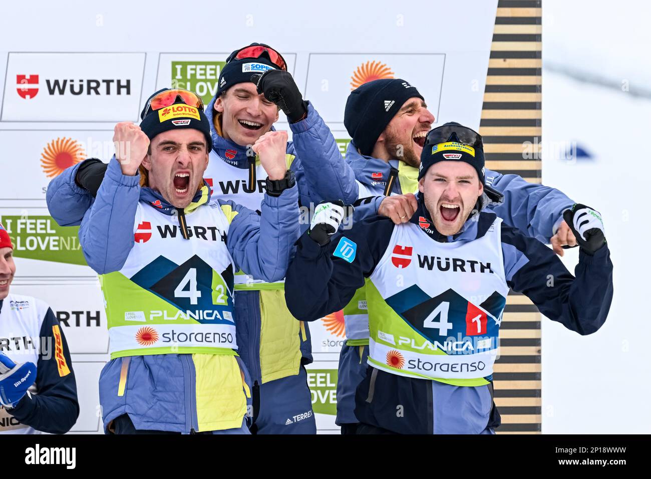 Members of team Germany celebrate their third place during the Cross ...