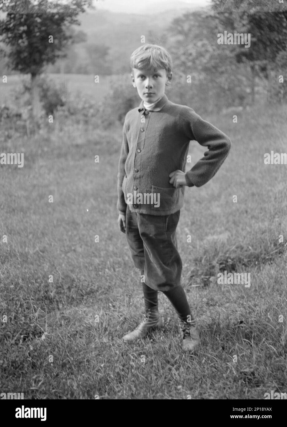 Unidentified child, standing outdoors, between 1896 and 1942. Boy ...