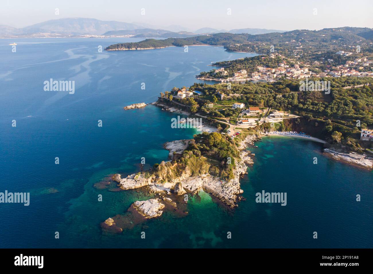 Aerial drone view of Kassiopi, village in northeast coast of Corfu ...