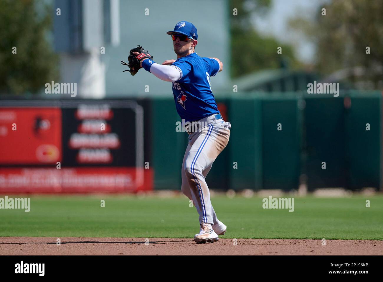 Toronto Blue Jays second baseman Cavan Biggio (8) throws to first base ...