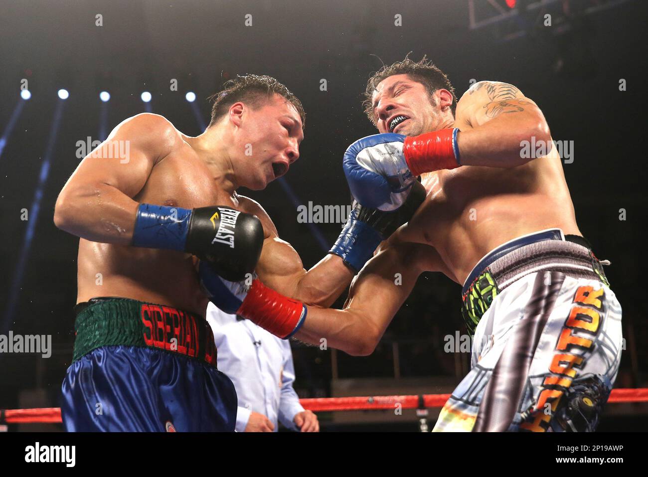 Ruslan Provodnikov (L) and John Monlina trade punches during a Showtime ...