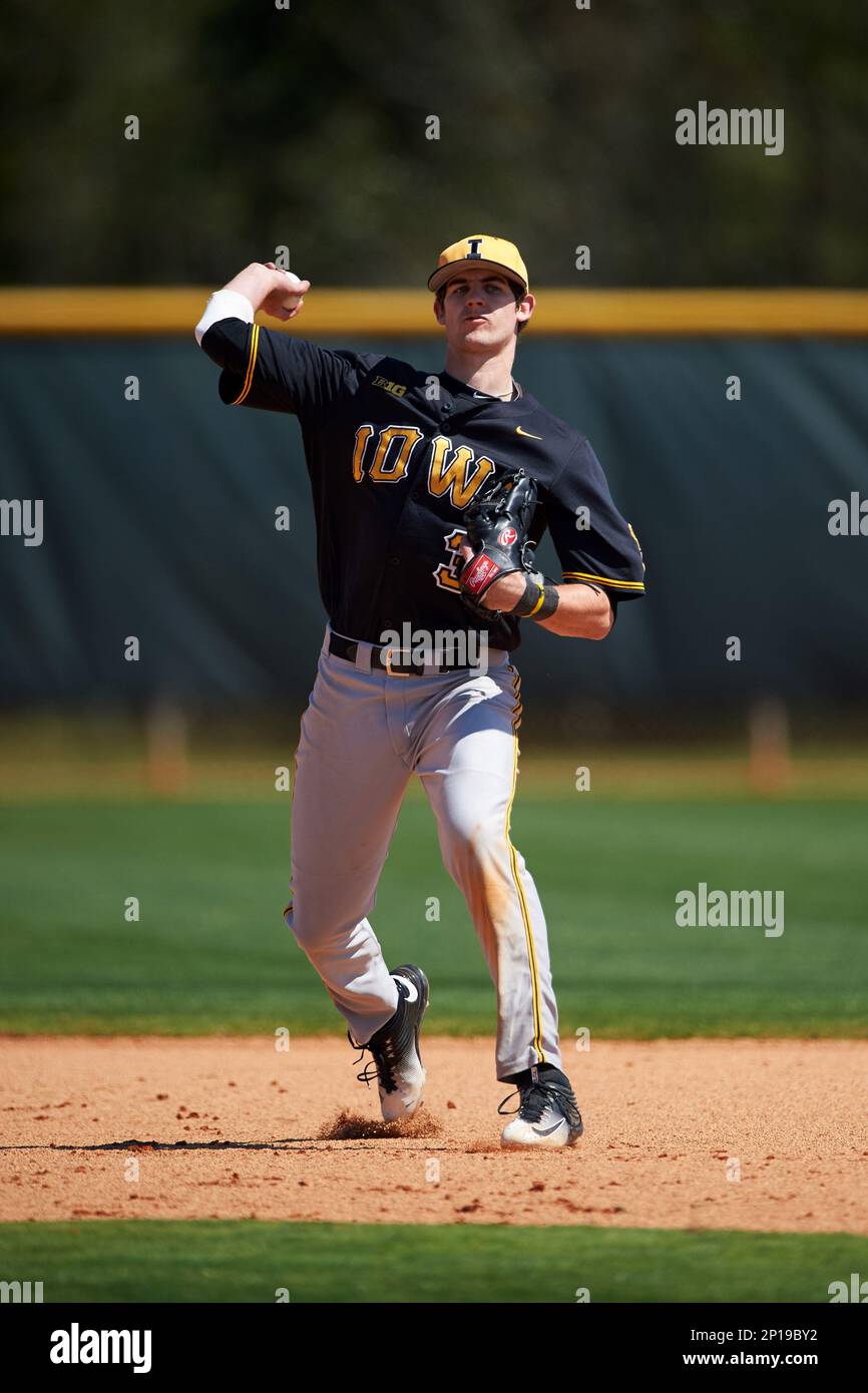 Iowa Hawkeyes shortstop Nick Roscetti (3) throws to first during a game ...