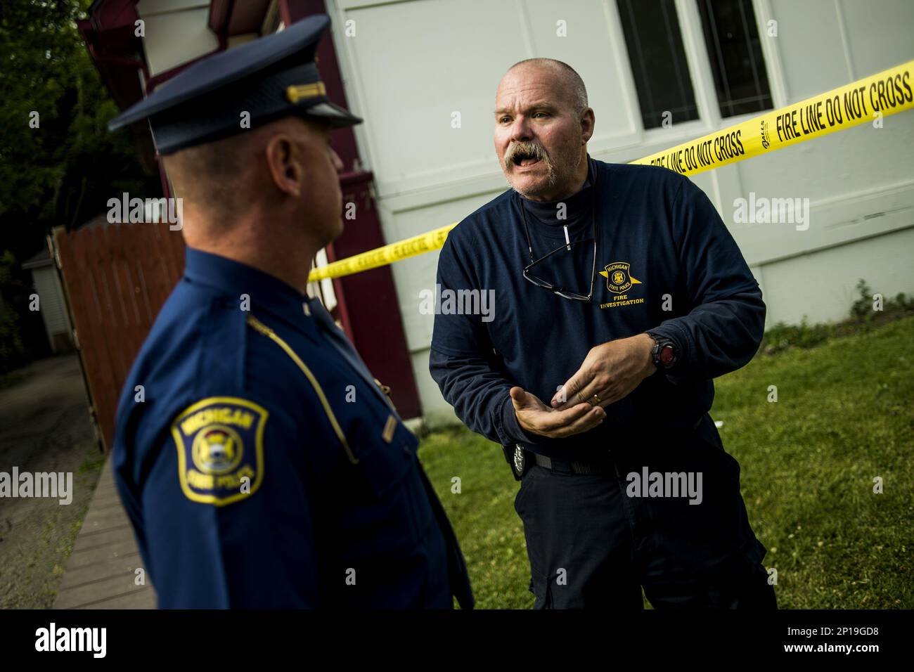 Michigan State Police Lt. David Kaiser, left, speaks with Sgt. Lenny ...