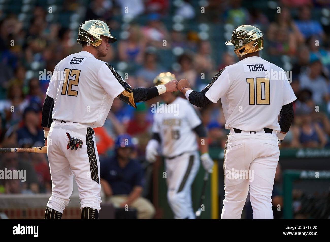 Seth Beer (12) of Lambert High School in Suwanee, Georgia fist bumps ...