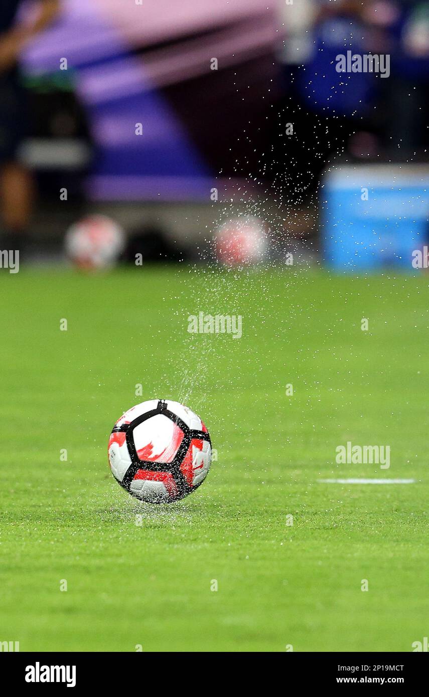 08 June 2016: A soccer ball leaves a rooster trail of water during ...