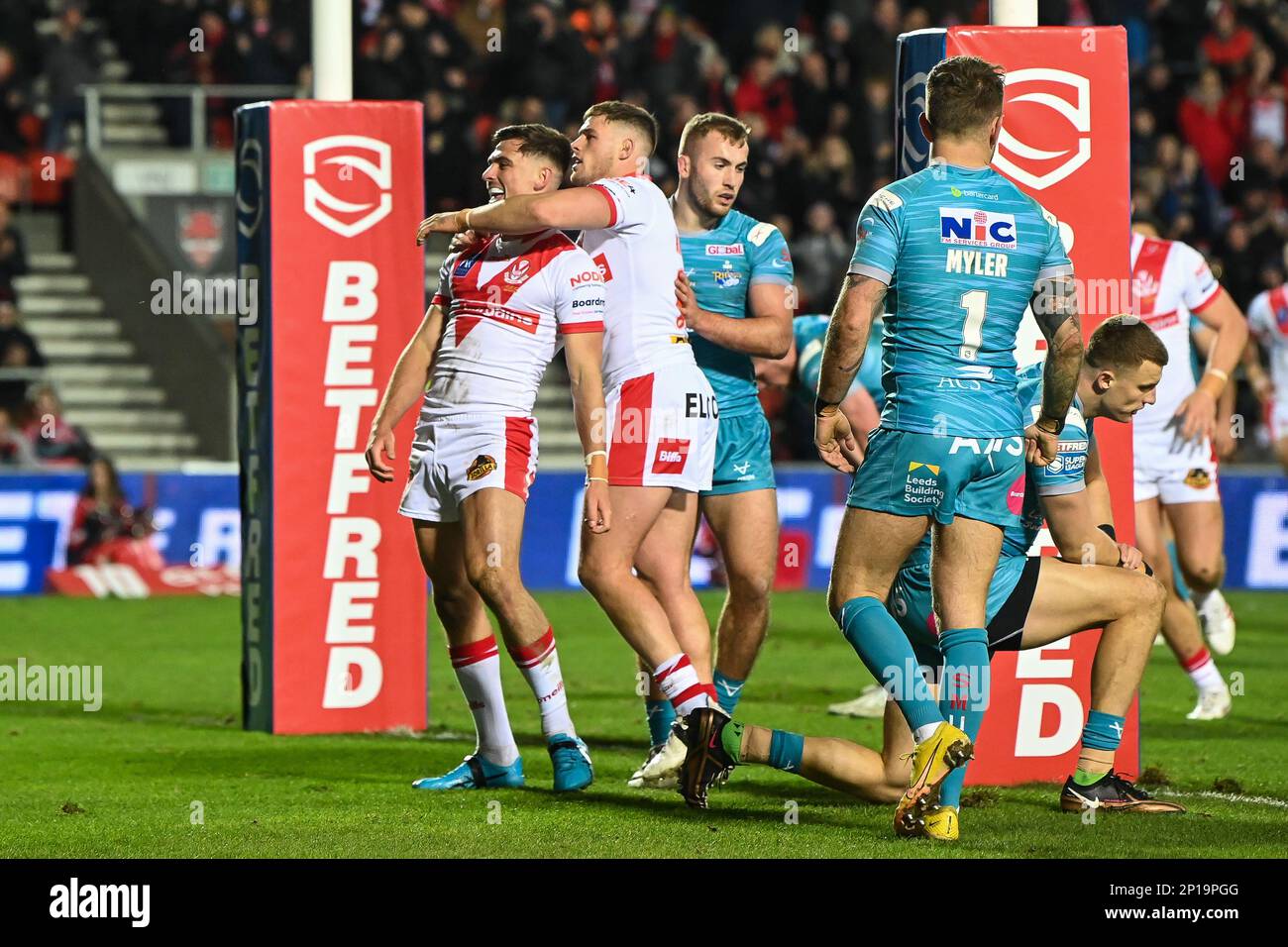 Lewis Dodd #7 of St. Helens celebrates his try during the Betfred Super ...