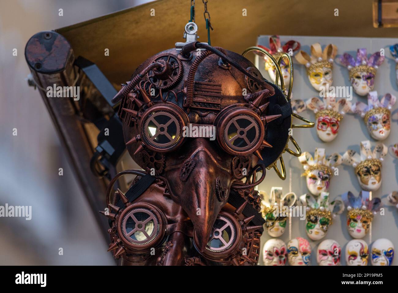 Mask hanging in a stand. Gas mask with copper colors Stock Photo - Alamy