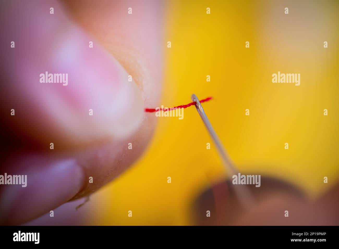 Threading the needle hi-res stock photography and images - Alamy