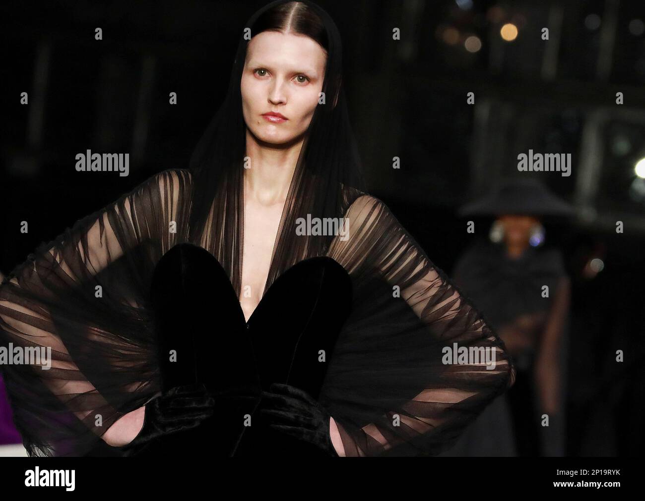 Paris, France. 01st Mar, 2023. A model takes to the catwalk during ...