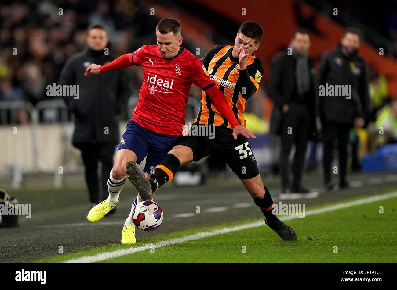 Hull City's Xavier Simons attempts to tackle West Bromwich Albion's Jed ...
