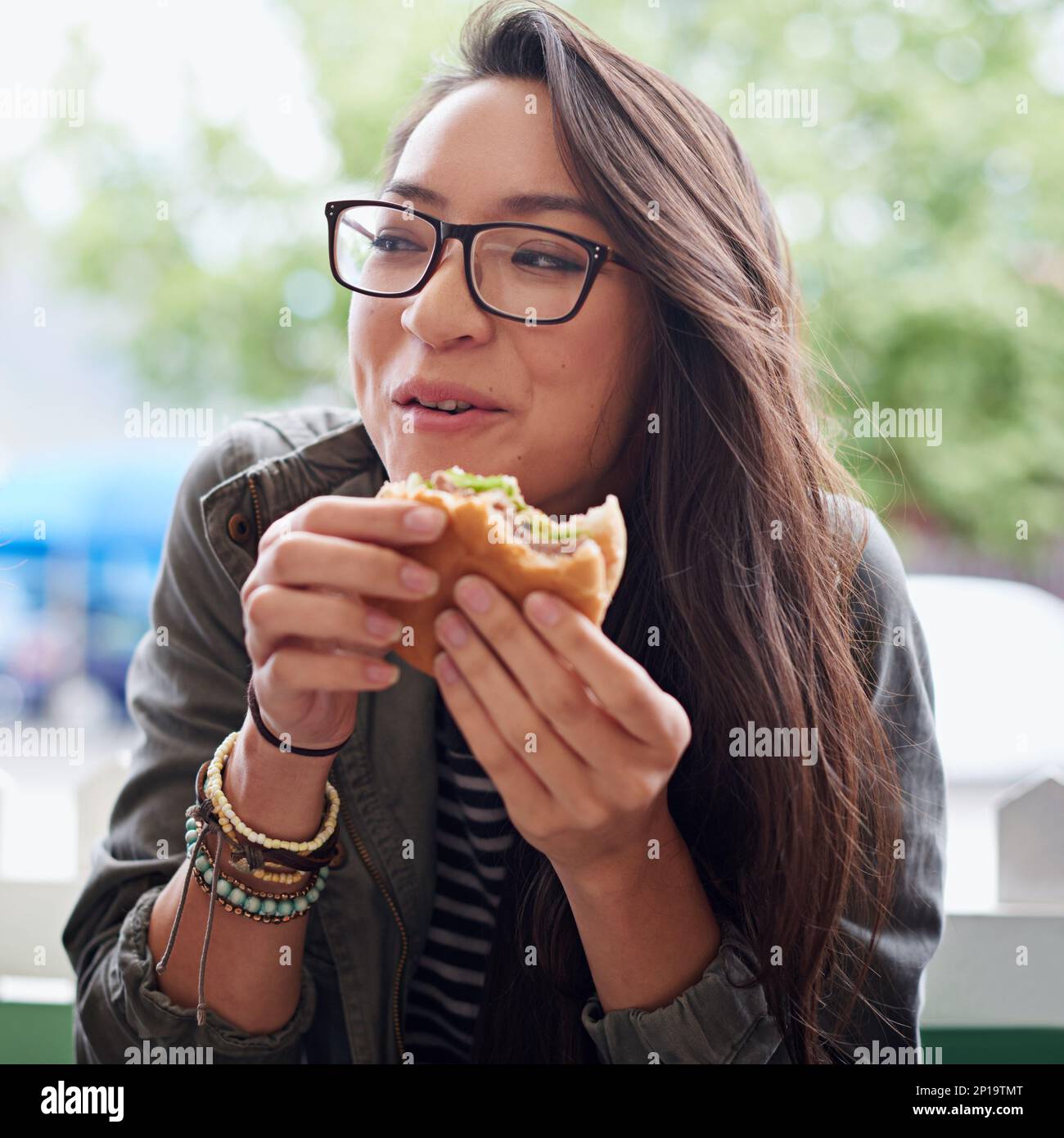 Food on the go. Students eating a meal together Stock Photo - Alamy
