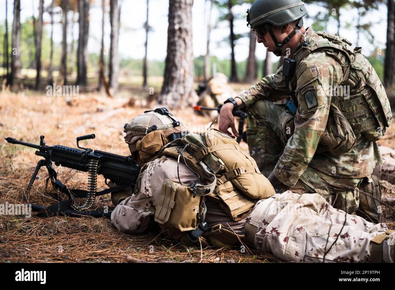 A U.S. Army 3rd Security Force Assistance Brigade Soldier gives ...