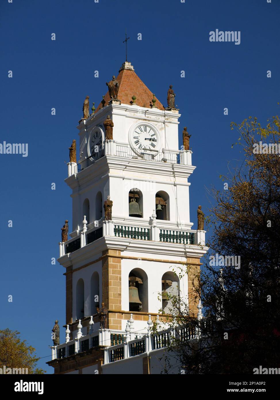 Colonial cathedral tower with clock and bell in Sucre, Bolivia Stock ...
