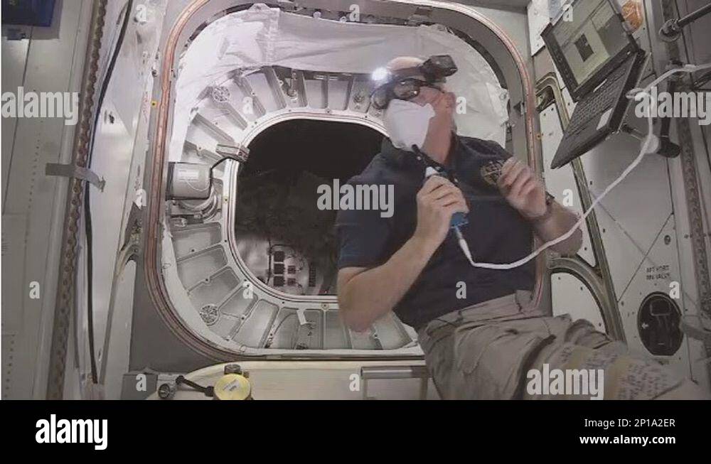 In this image provided by NASA, NASA astronaut Jeff Williams floats in ...