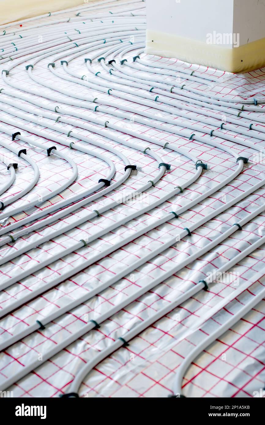 Installation of underfloor heating pipes for water heating. Heating systems. Pipes for ...