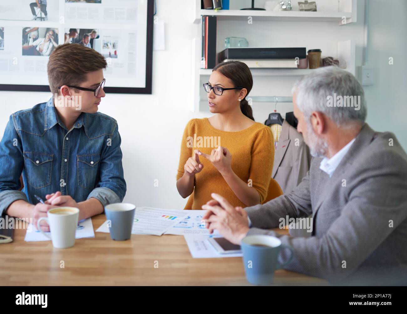 So this is what I think.... Shot of a group of coworkers brainstorming ...