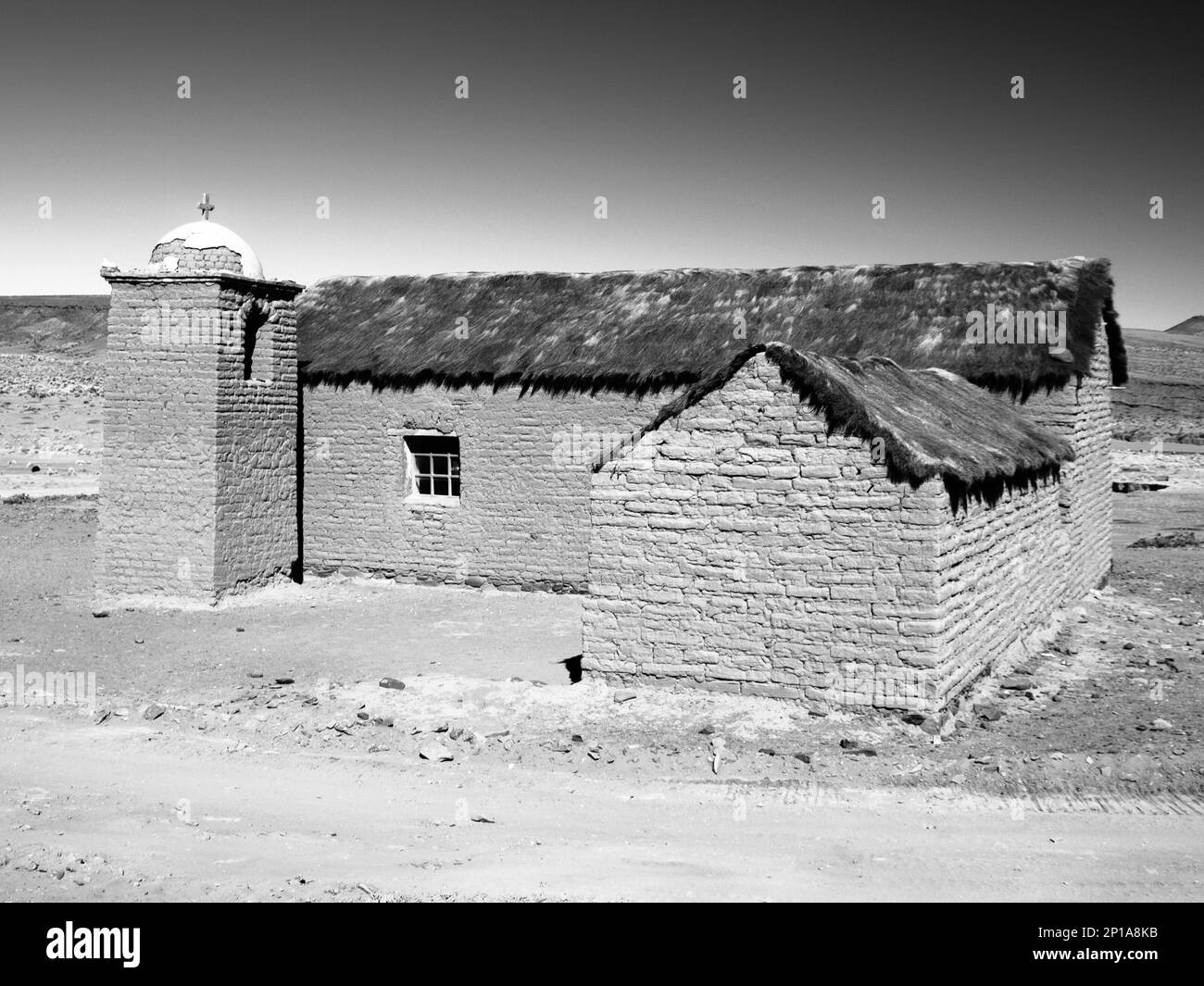 Small rural andean style church made of unfired clay bricks, Cordillera ...