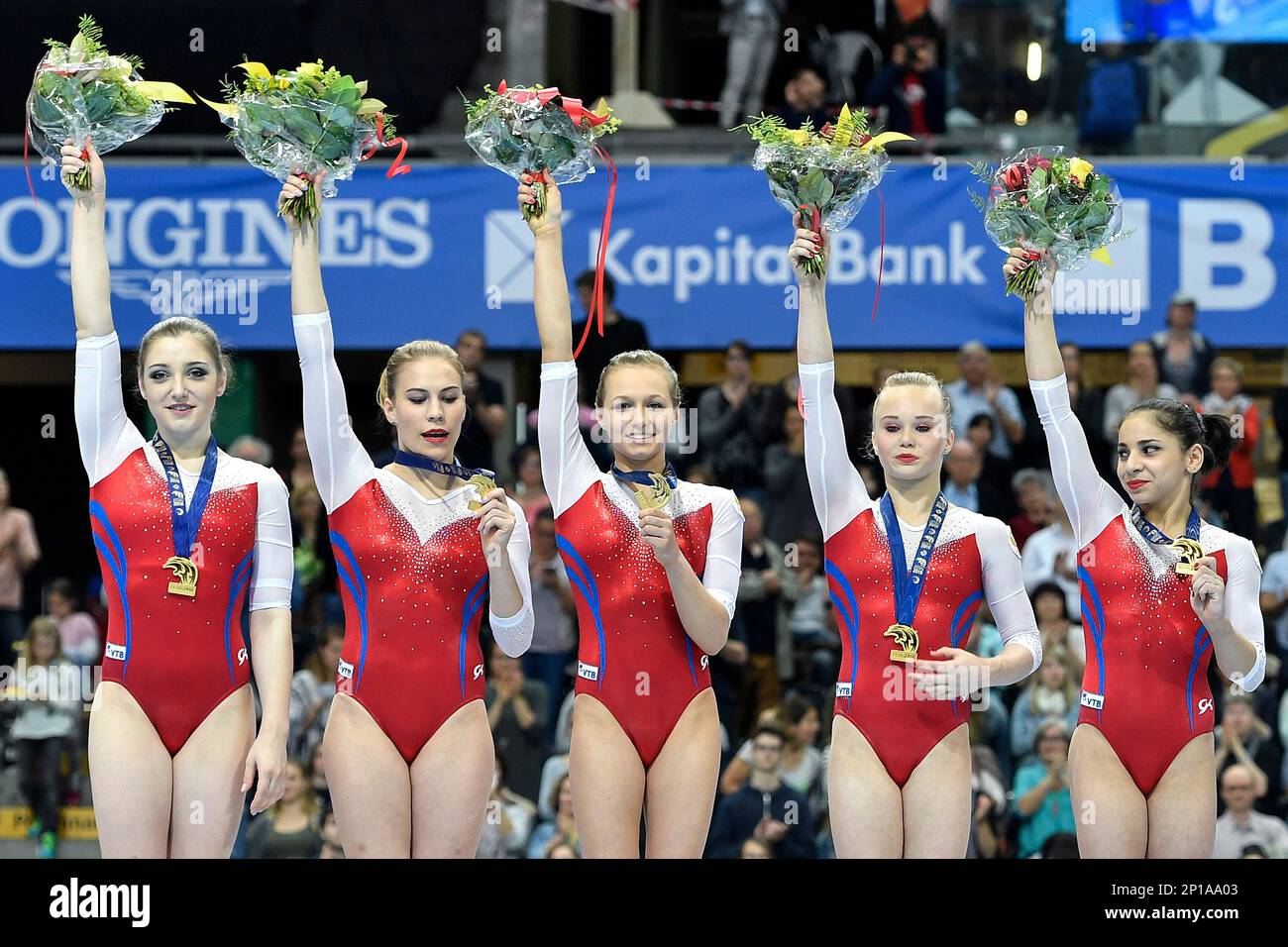 Members of the Russia team, from left, Aliya Mustafina, Kseniia Afanaseva, Daria Spiridonova ...