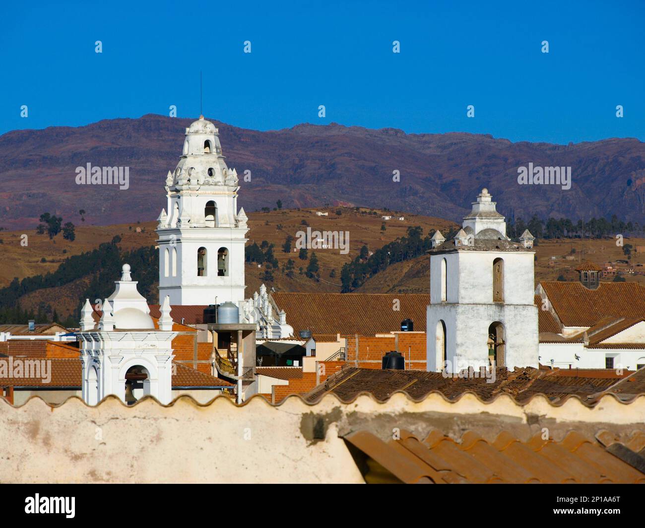 White colonial towers and orange rooftops in Sucre (Bolivia Stock Photo ...