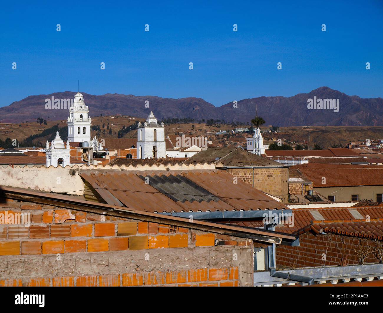 White colonial towers and orange rooftops in Sucre (Bolivia Stock Photo ...