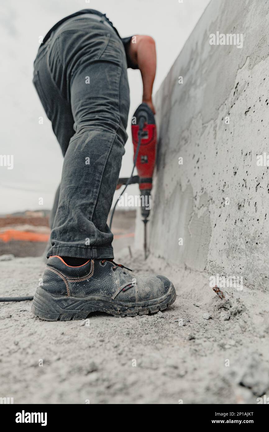 Vertical shot male industrial worker hi-res stock photography and ...