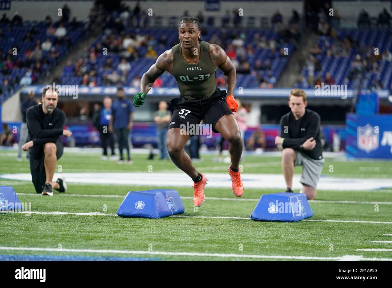Florida A&M defensive lineman Isaiah Land runs a drill at the NFL ...