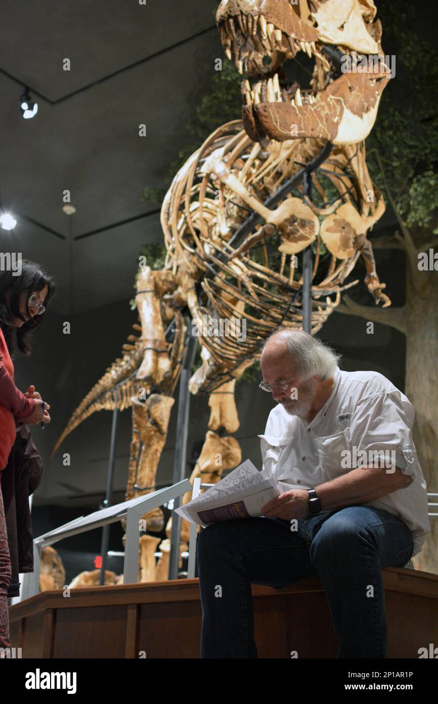 In this Saturday, May 21, 2016, photo, paleontologist Jack Horner signs ...