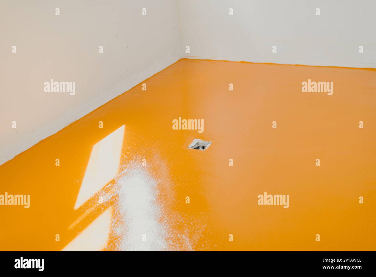 cold storage with new floor made of yellow epoxy resin Stock Photo - Alamy
