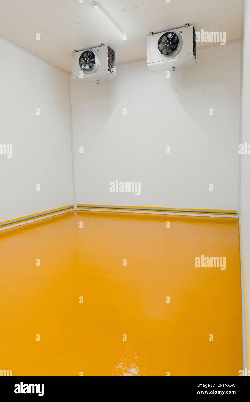 cold storage with new floor made of yellow epoxy resin Stock Photo - Alamy