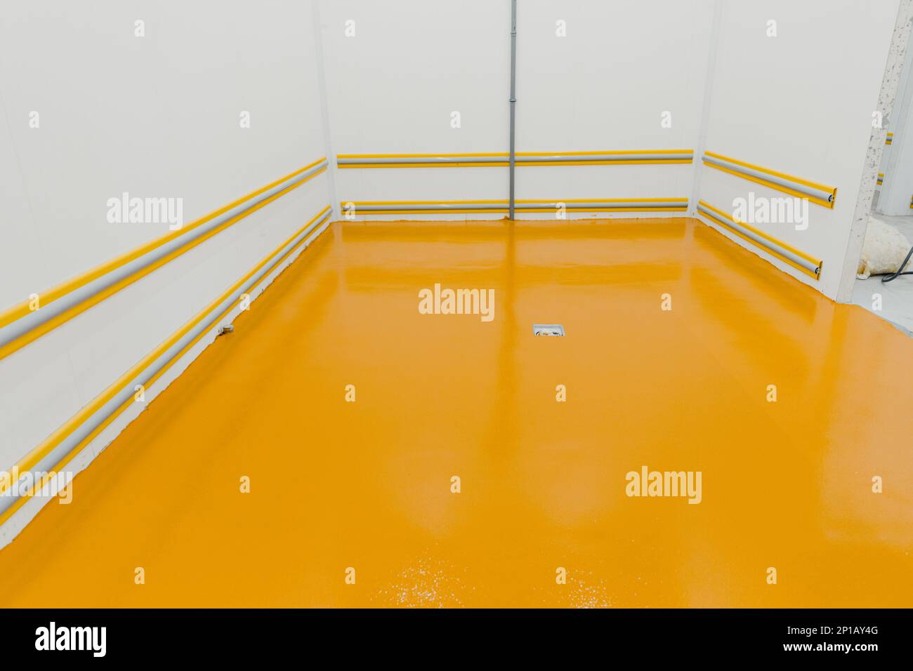 cold storage with new floor made of yellow epoxy resin Stock Photo - Alamy
